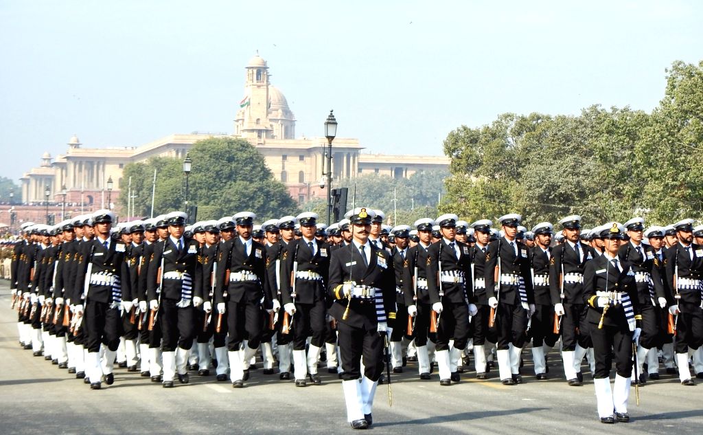 Indian Navy personnel march past during a rehearsal
