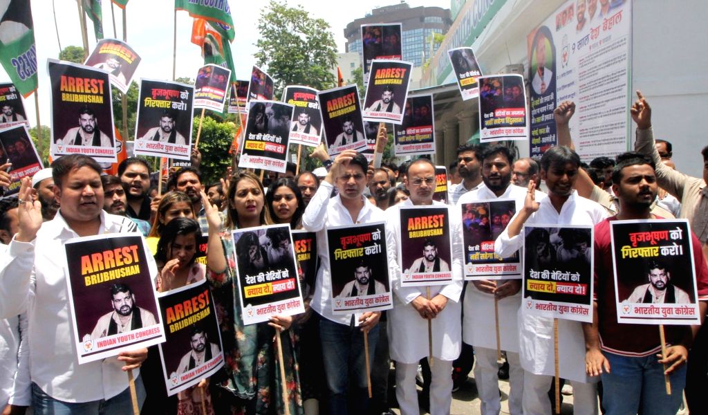 Indian Youth Congress (IYC) stage a protest demanding the arrest of WFI ...