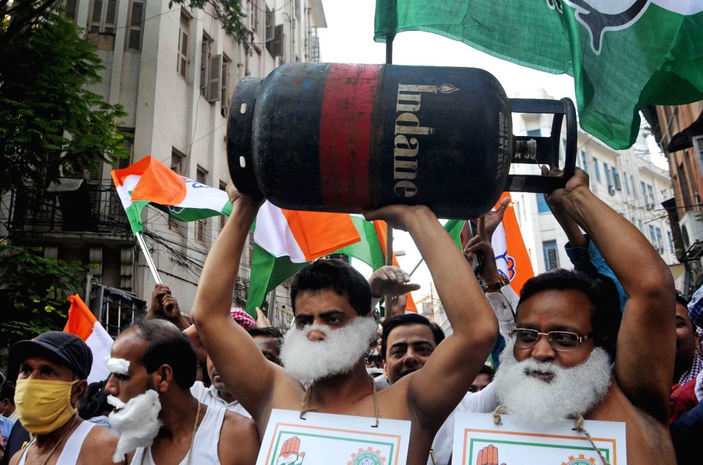 INTUC activists took part in a protest rally against fuel and essential ...