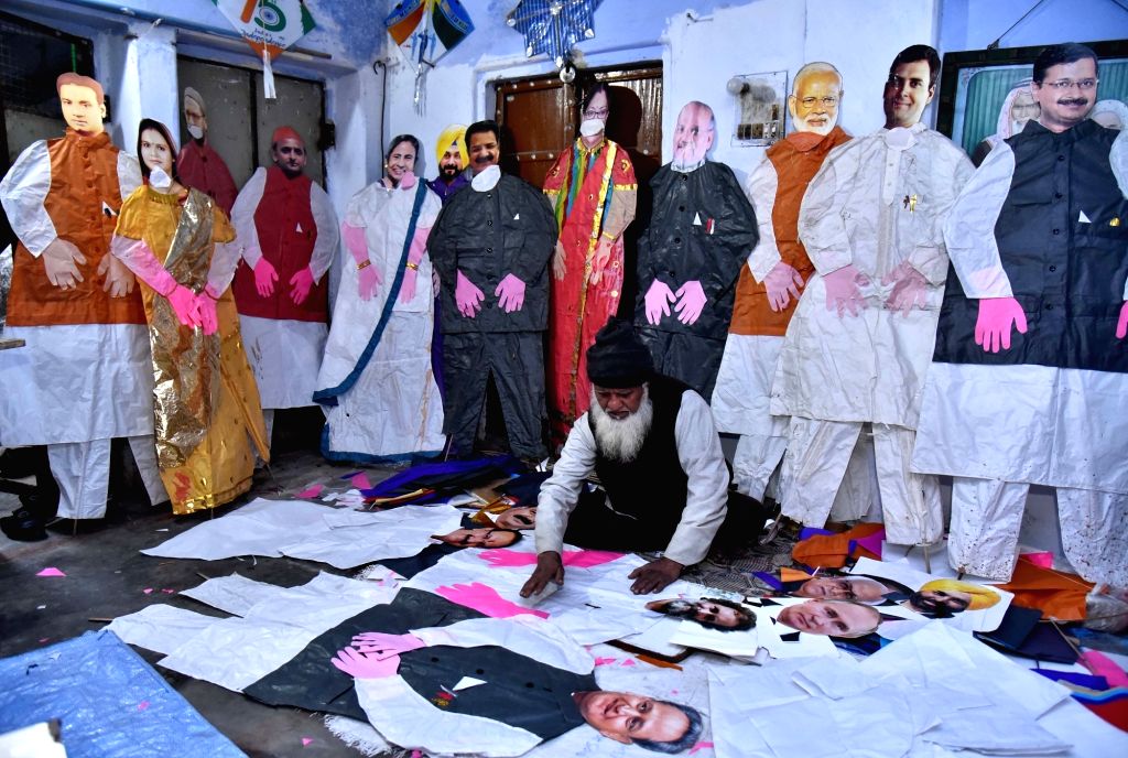 A kitemaker creates life-size kites with pictures of different ...
