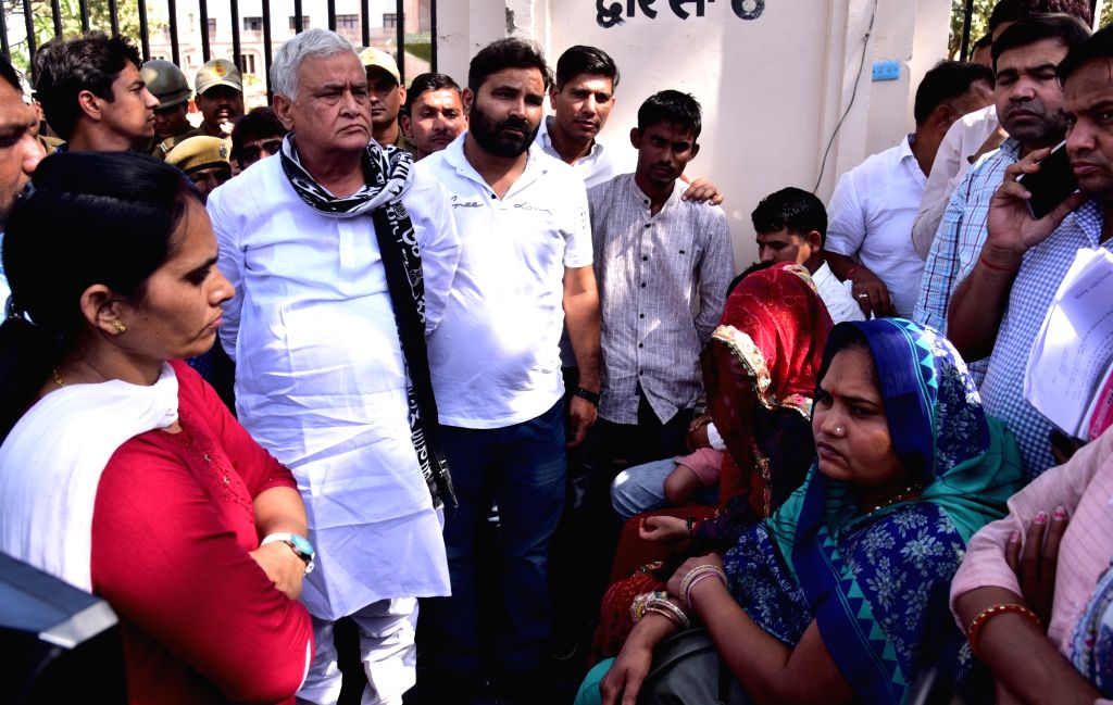 BJP MP Kirori Lal Meena with the wives of Pulwama attack's victims ...