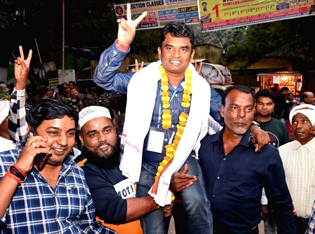 JMM candidate Sanjib Sardar flashes a victory sign after winning the ...