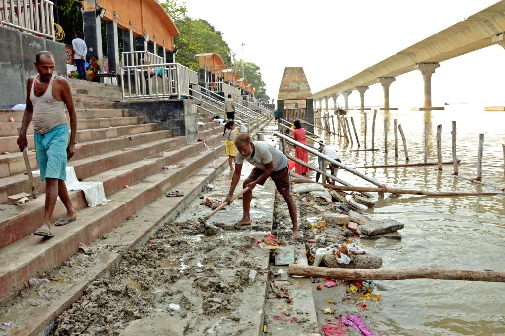 Kali Ghat being cleaned for devotees to take holy dip in river Ganga