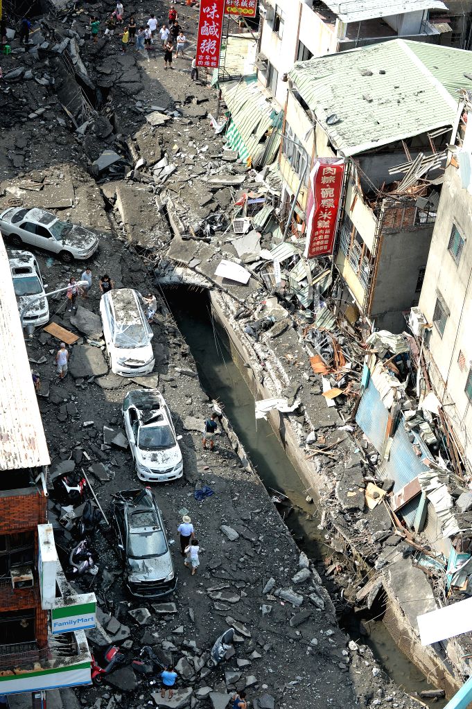 Destroyed roads and buildings after gas leak explosions