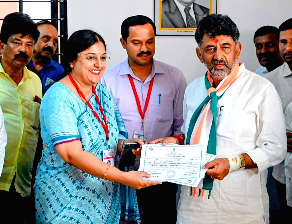 Karnataka Congress President D.K. Shivakumar receives his certificate ...