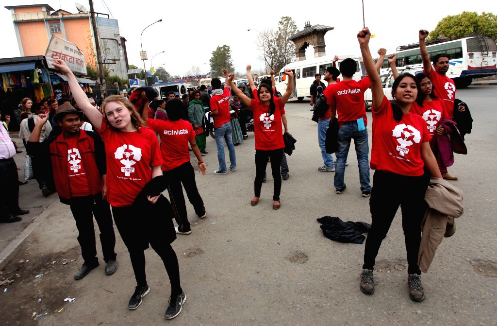 Activists present a flash mob to protest against sexual harassment of ...