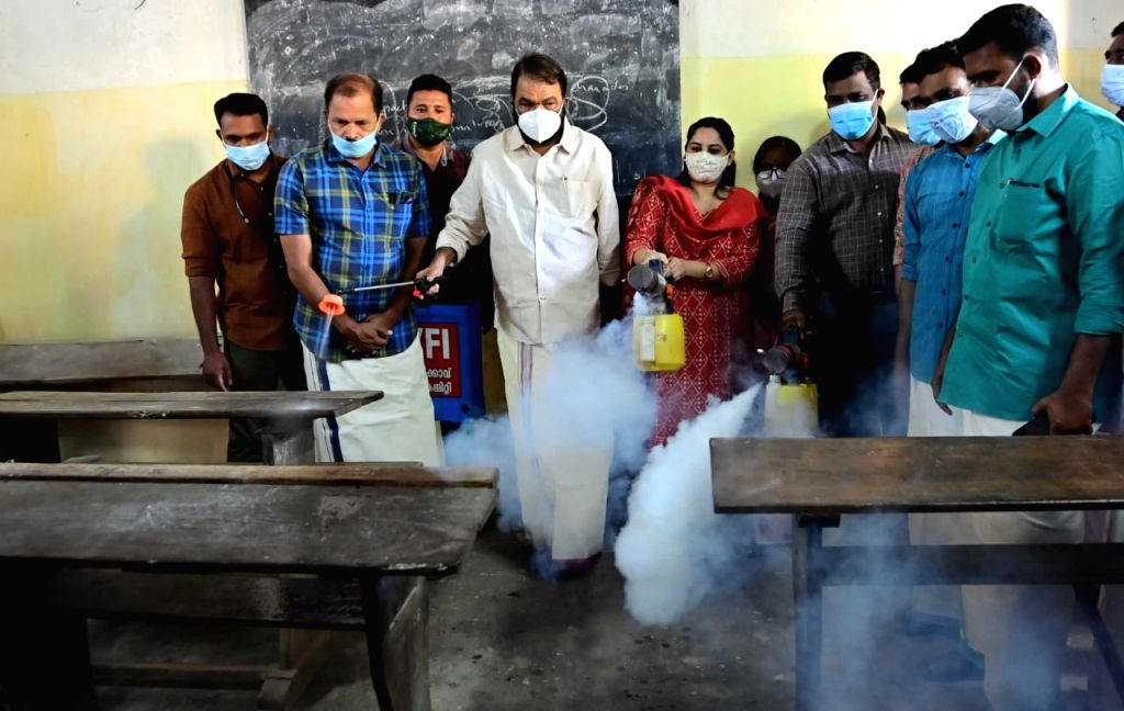 Free Photo:Kerala schools being cleaned up for welcoming students led ...