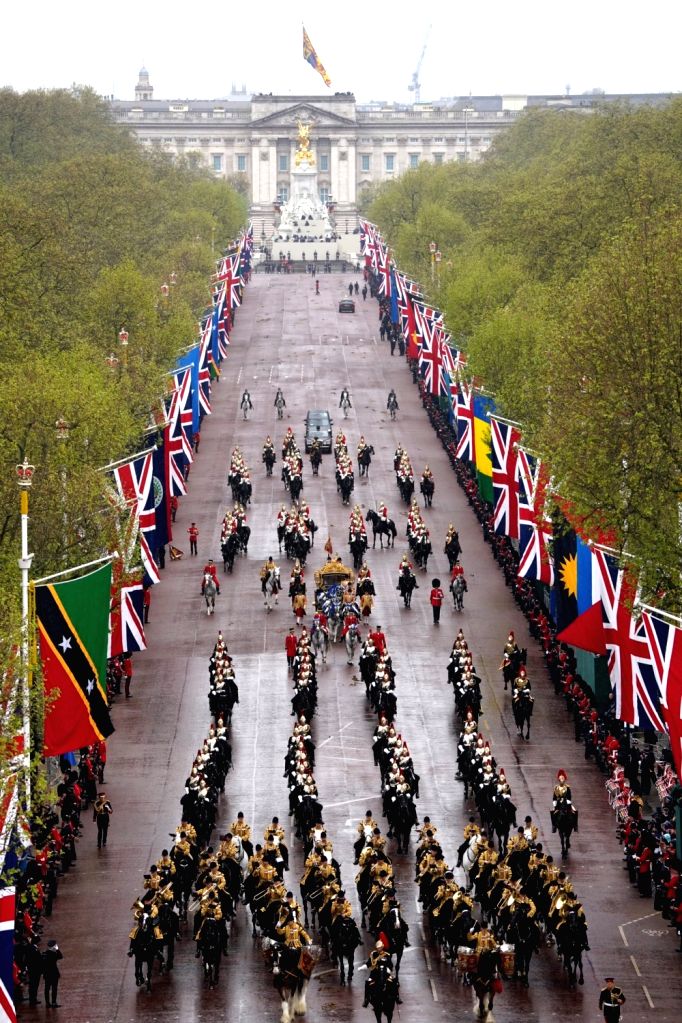 King Charles III and his wife Camilla on their way to Westminster Abbey