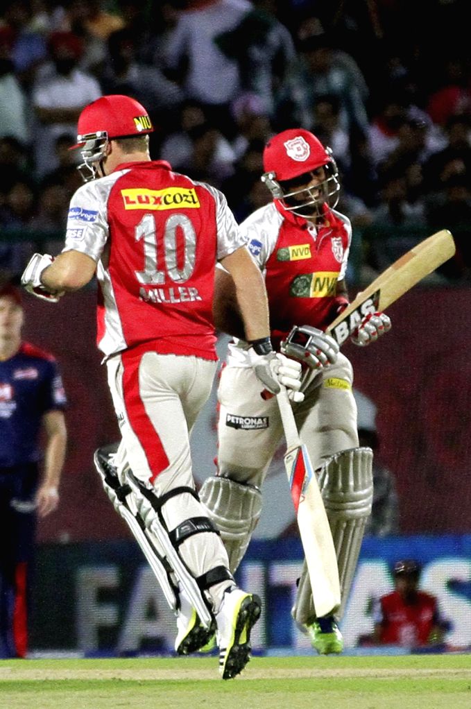 Kings XI Punjab player David Miller and R Satish taking run during the ...