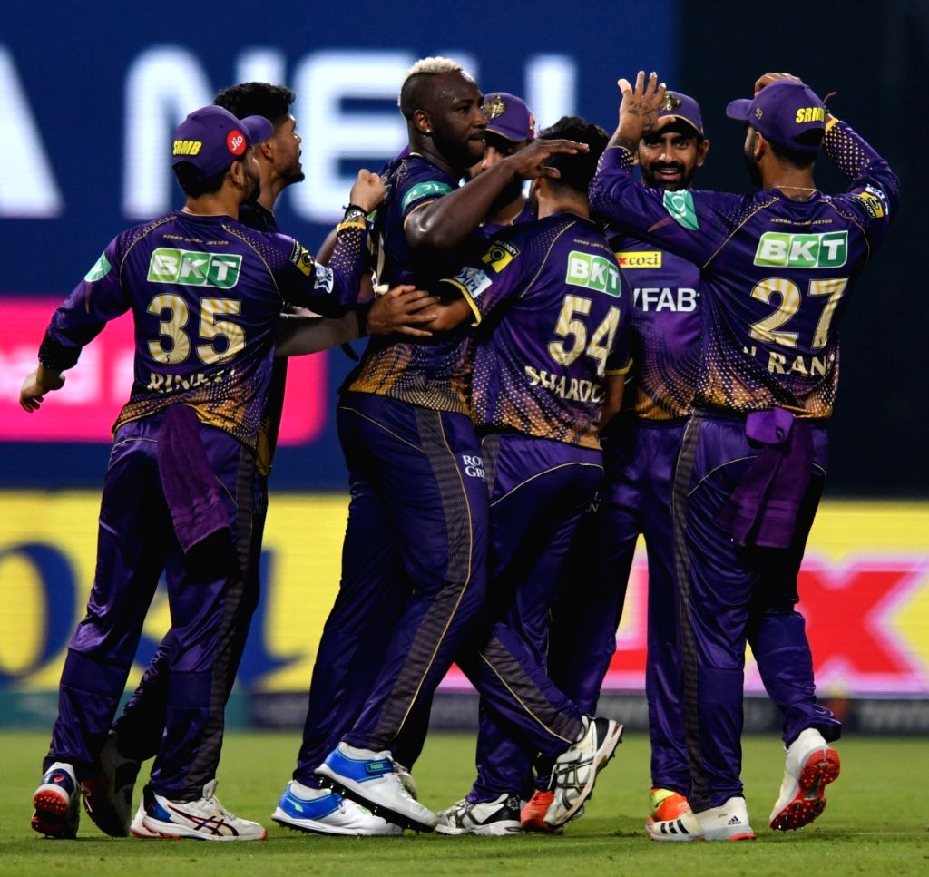 KKR's Andre Russell with teammates celebrate a dismissal during the IPL ...