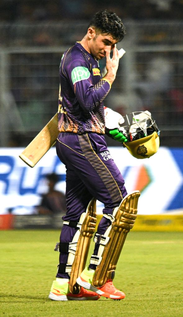 KKR's batsman Rahmanullah Gurbaz walks back after his dismissal