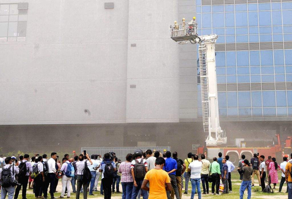 Kolkata : Firefighters try to douse a fire after it breaks out at a ...