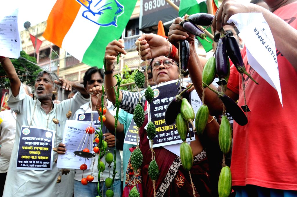 Kolkata : Members of INTUC Sevadal take part in a protest rally