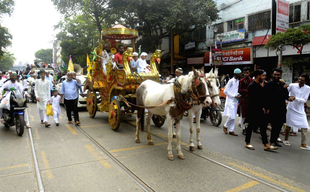 Kolkata : Muslim devotees take part in a religious procession on the ...