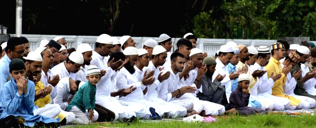 Kolkata : Muslims devotees offer prayers at Red Road on the occasion of ...