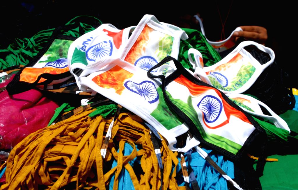 People wear tricolored masks to mark 74th Independence Day