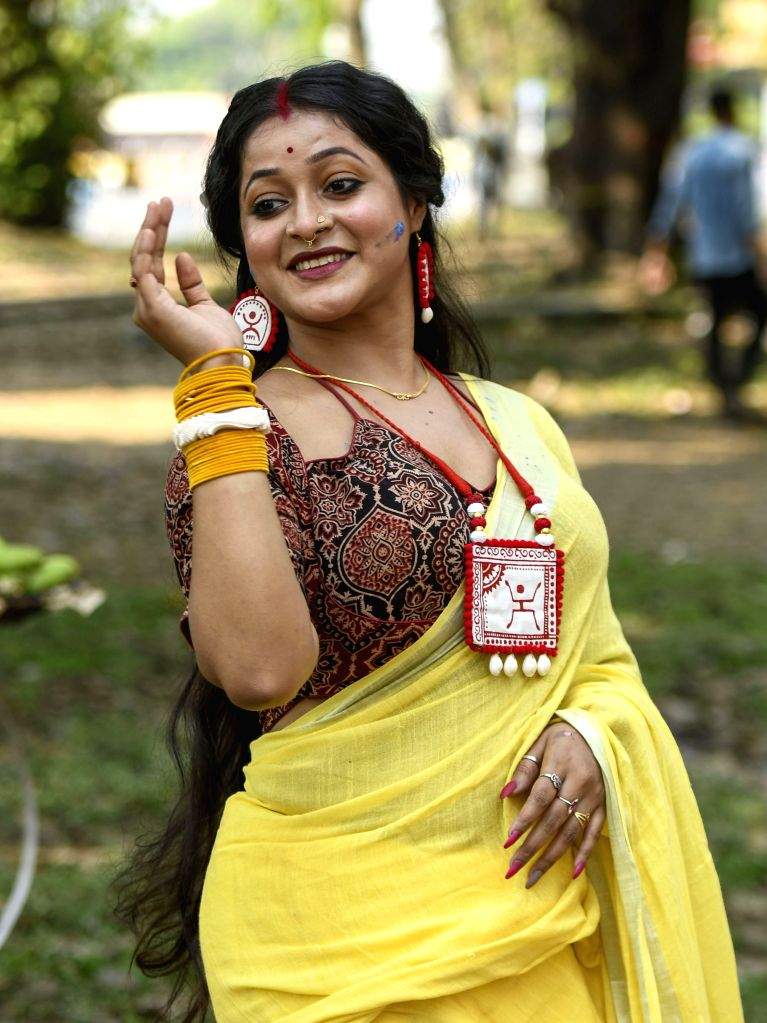 Woman celebrates Basanta Utsav (Holi)