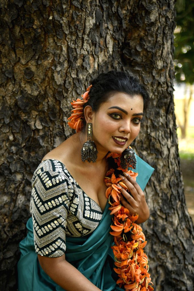 Woman celebrates Basanta Utsav (Holi)