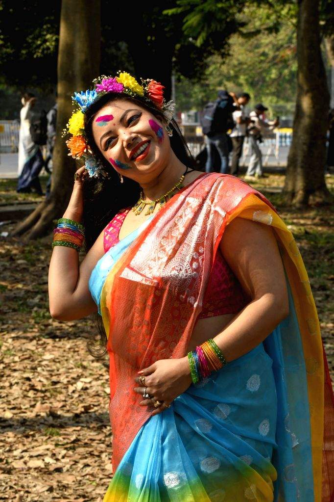 Woman celebrates Basanta Utsav (Holi)