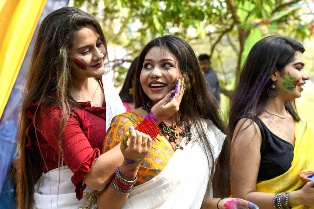 Woman celebrates Basanta Utsav (Holi)