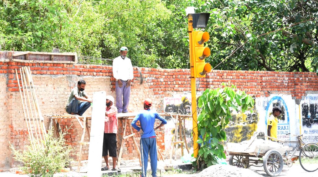 New Delhi:Labour working on a Construction site after construction and ...