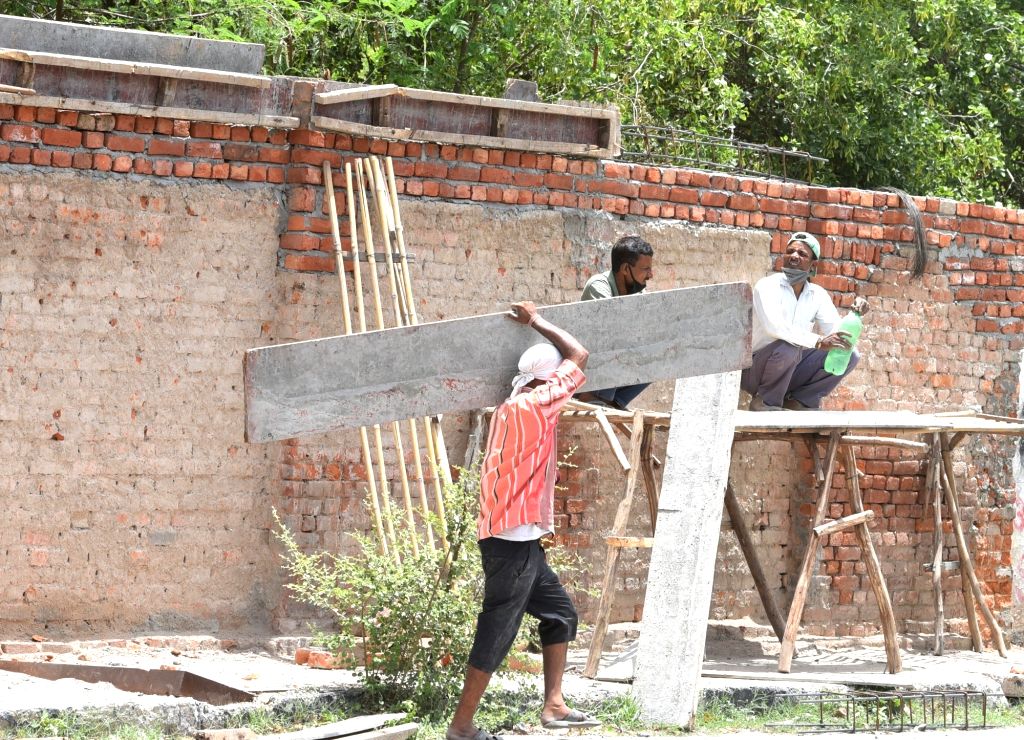 New Delhi:Labour working on a Construction site after construction and ...