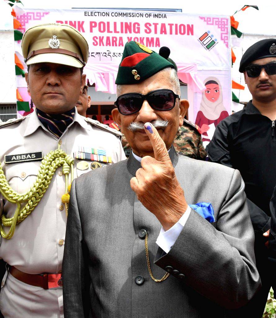 Ladakh Lieutenant Governor BD Mishra shows his ink-marked finger after ...