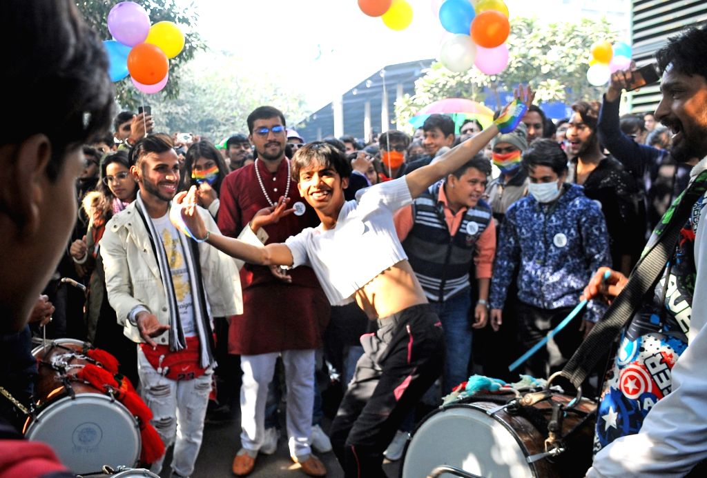 LGBTQ community members dance while taking part in the Delhi Queer ...