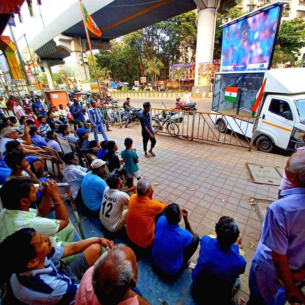 Locals watch a live telecast of the ICC Men’s Cricket World Cup 2023 ...