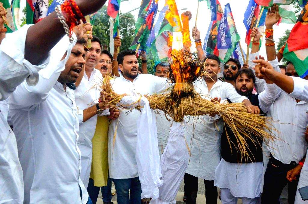 Lok Janshakti Party (Ram Vilas) workers burn an effigy of WB CM Mamata ...