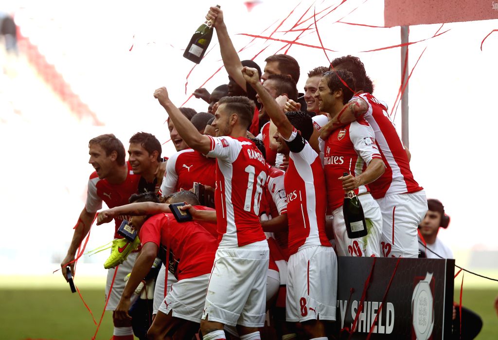 Celebrate after the Community Shield match between Arsenal and Manchester