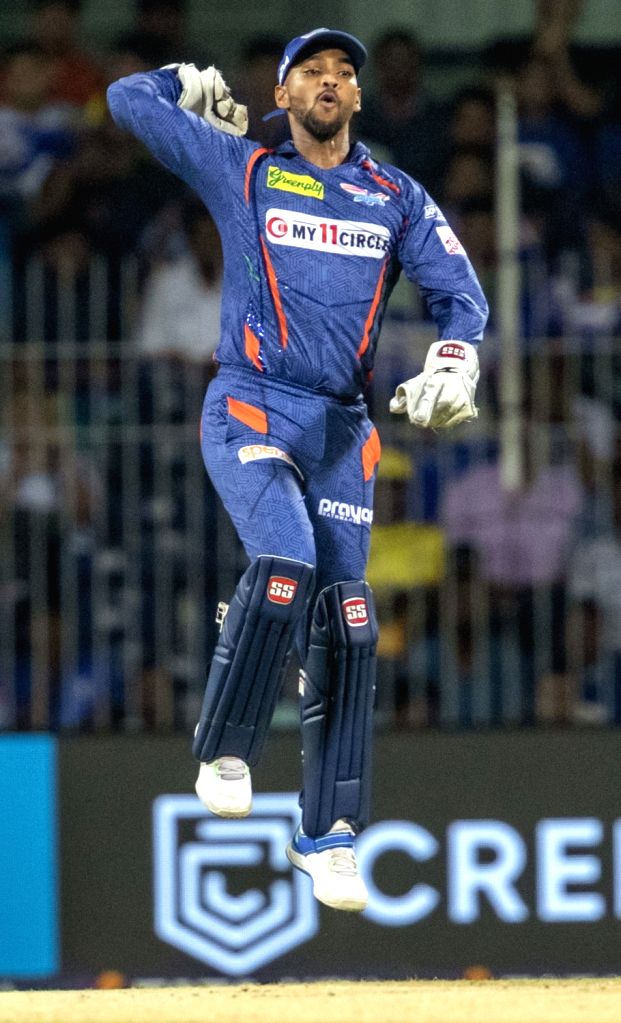 LSG's wicket-keeper Nicholas Pooran celebrates the dismissal of MI's ...