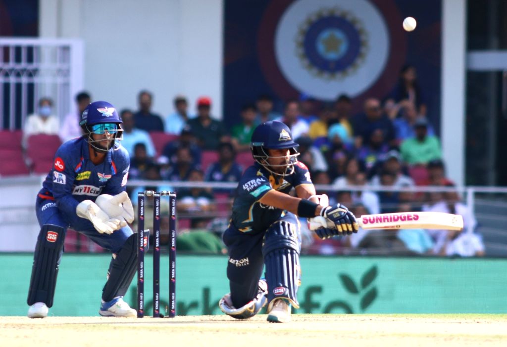 Lucknow : Gujarat Titans' Wriddhiman Saha plays a shot