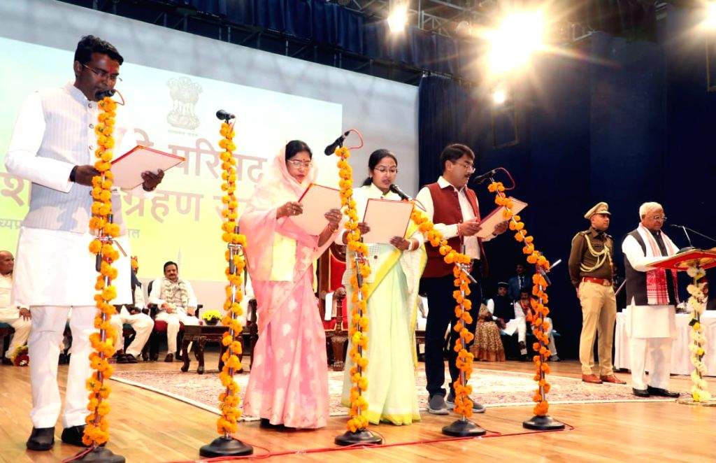 Madhya Pradesh Governor Mangubhai Patel administers the oath of the ...