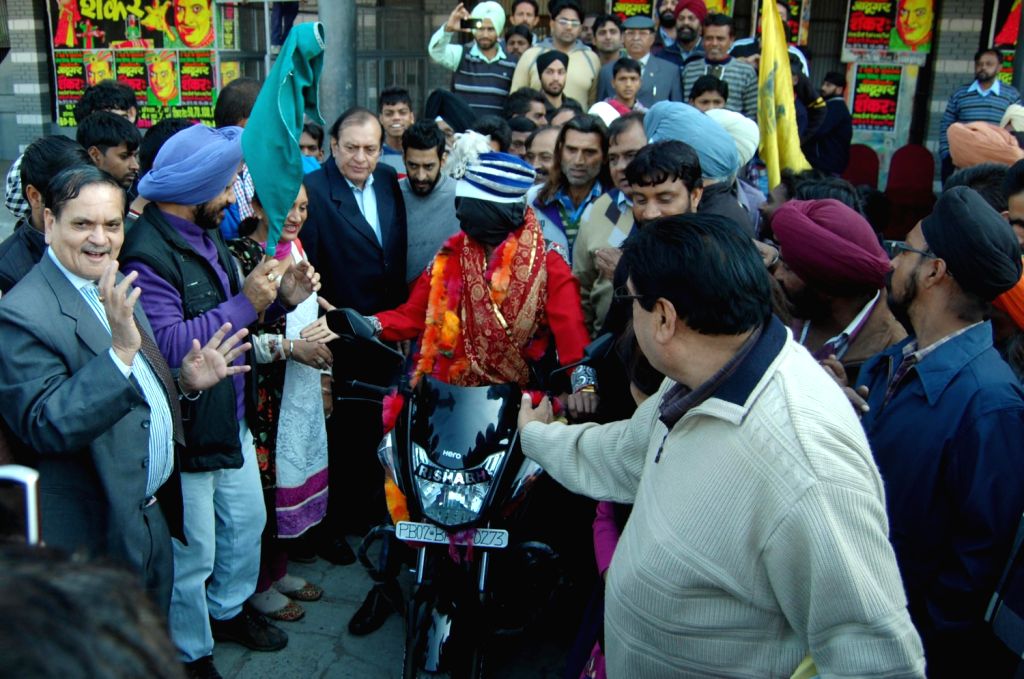 Magician Samrat Shankar rides a motor cycle blindfolded
