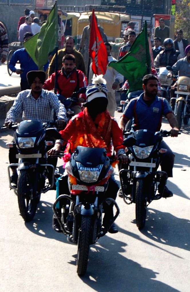 Magician Samrat Shankar rides a motor cycle blindfolded