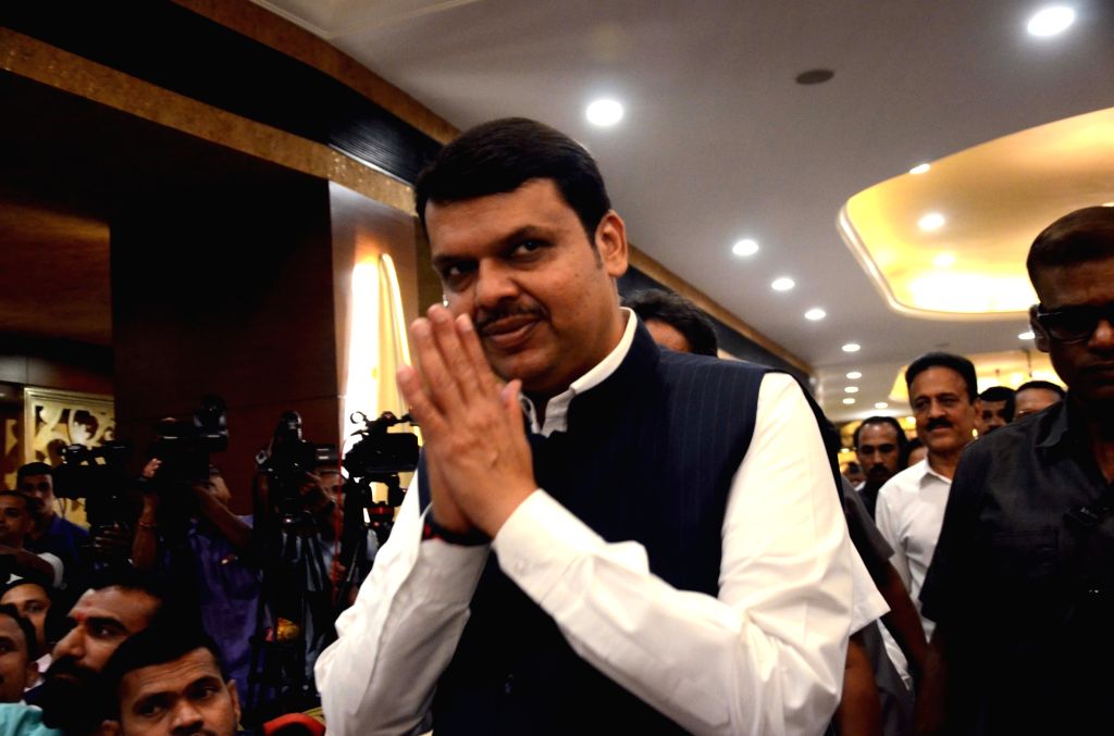 Congress' Pravin Chheda, NCP's Bharati Pawar join BJP