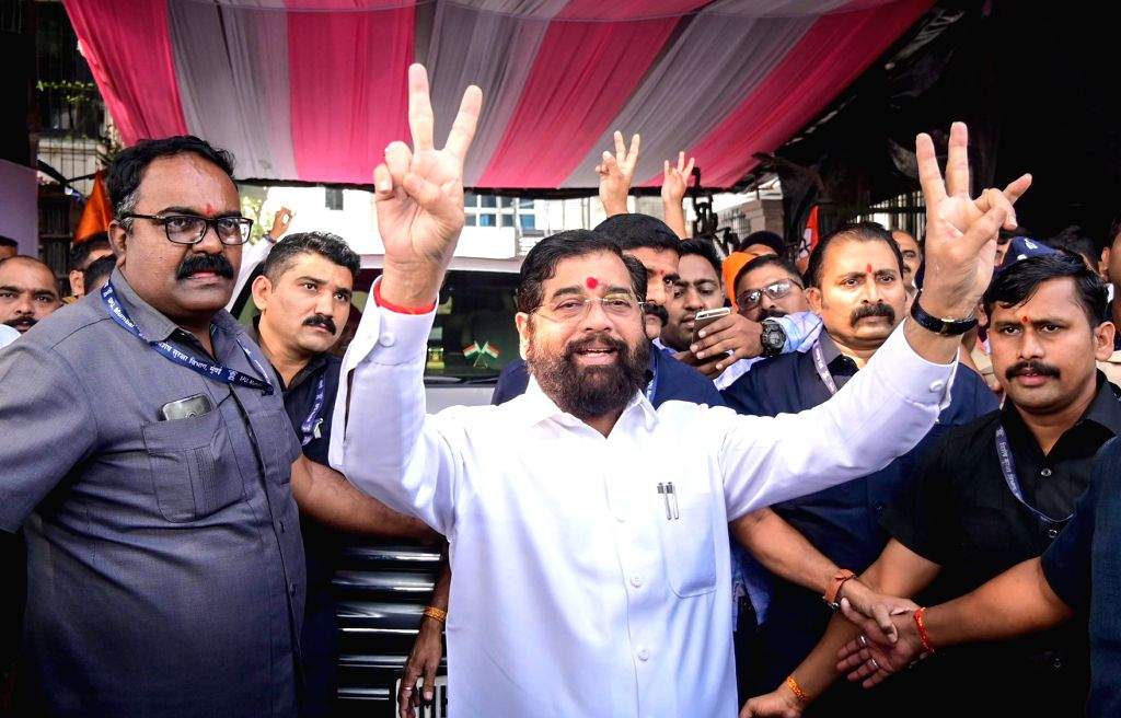 Maharashtra CM Eknath Shinde flashes a victory sign following the NDA's ...