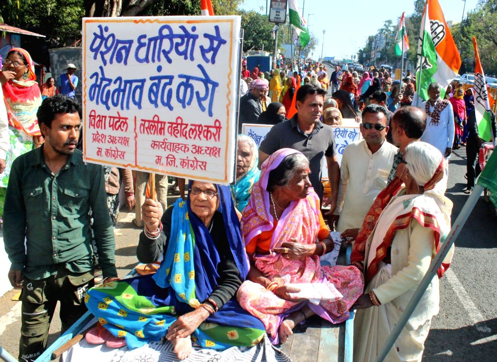 : Bhopal: Mahila Congress workers along with elderly pensioners stage a ...