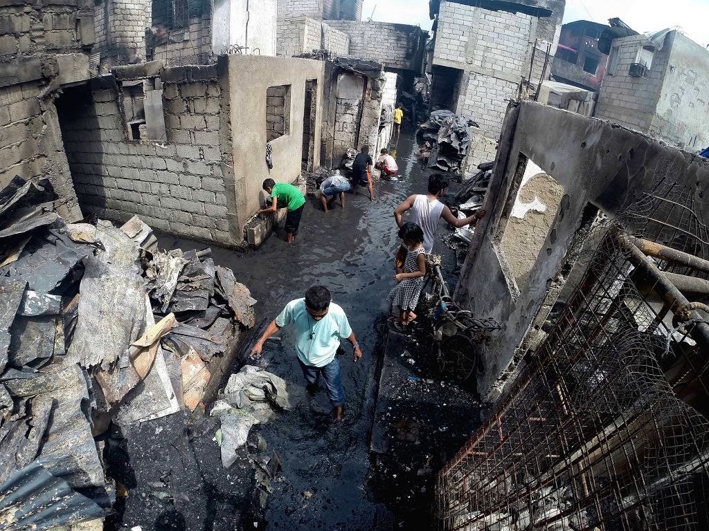 PHILIPPINES-MANILA-SLUM AREA FIRE-AFTERMATH