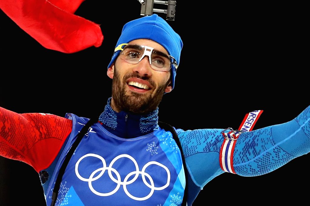Fourcade becomes PyeongChang's first triple gold medalist
