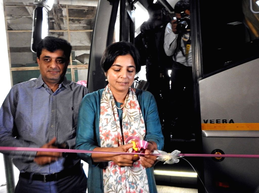 MD and CEO of Green Cell Mobility Devendra Chawla along with Mahua ...