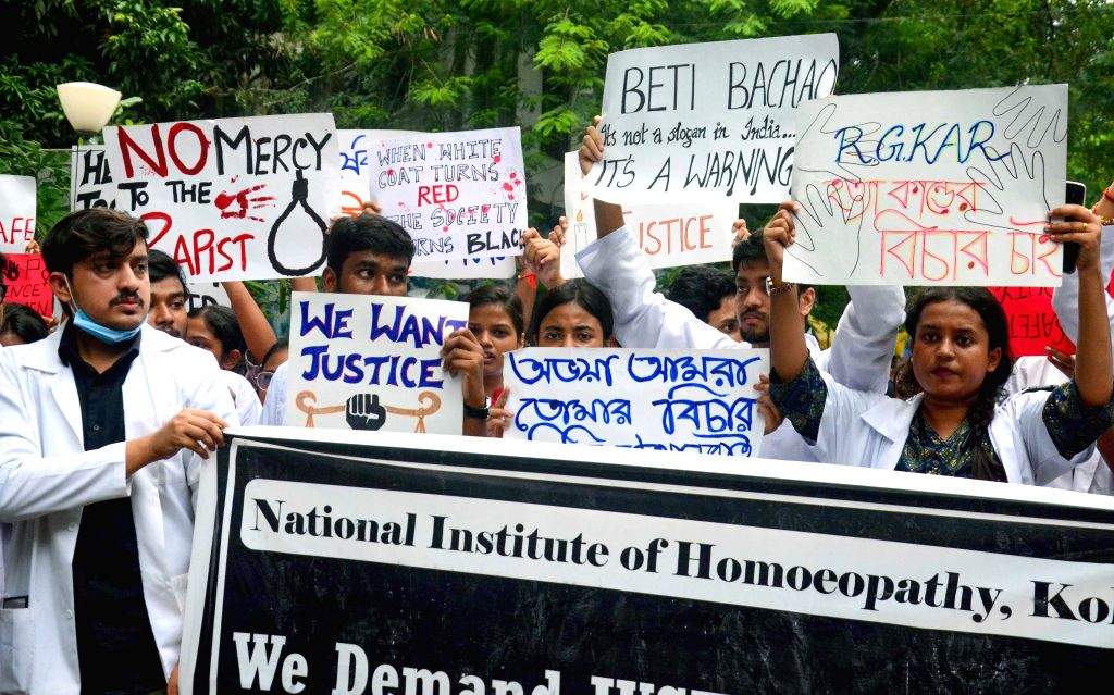 Medical professionals take out a protest march against the rape and ...