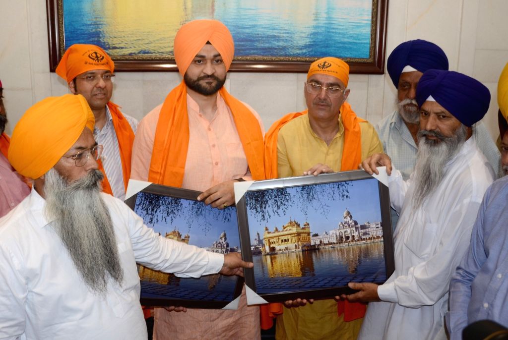 MP Sanjay Bhatia and Haryana Sports Minister Sandeep Singh being ...