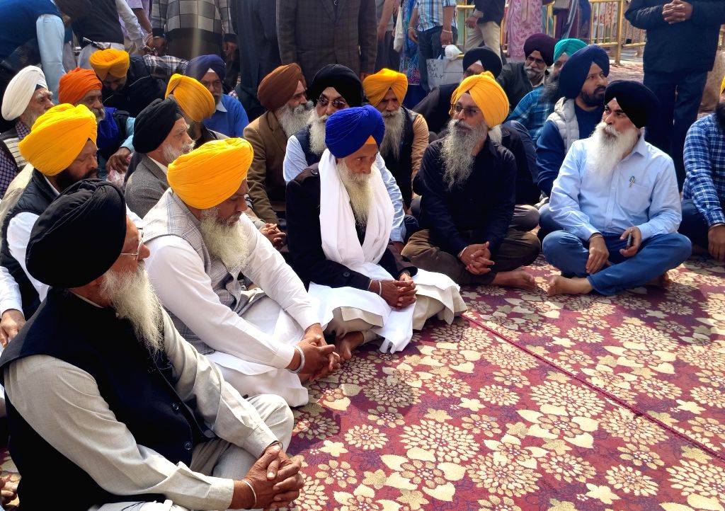 Members of Akal Purkh Ki Fauj offer prayers at Sri Akal Takht Sahib