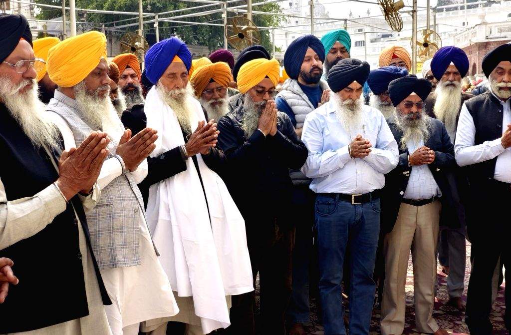 Members of Akal Purkh Ki Fauj offer prayers at Sri Akal Takht Sahib