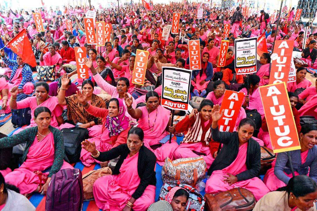Members of ASHA workers, in support of AITUC, protest at Freedom Park