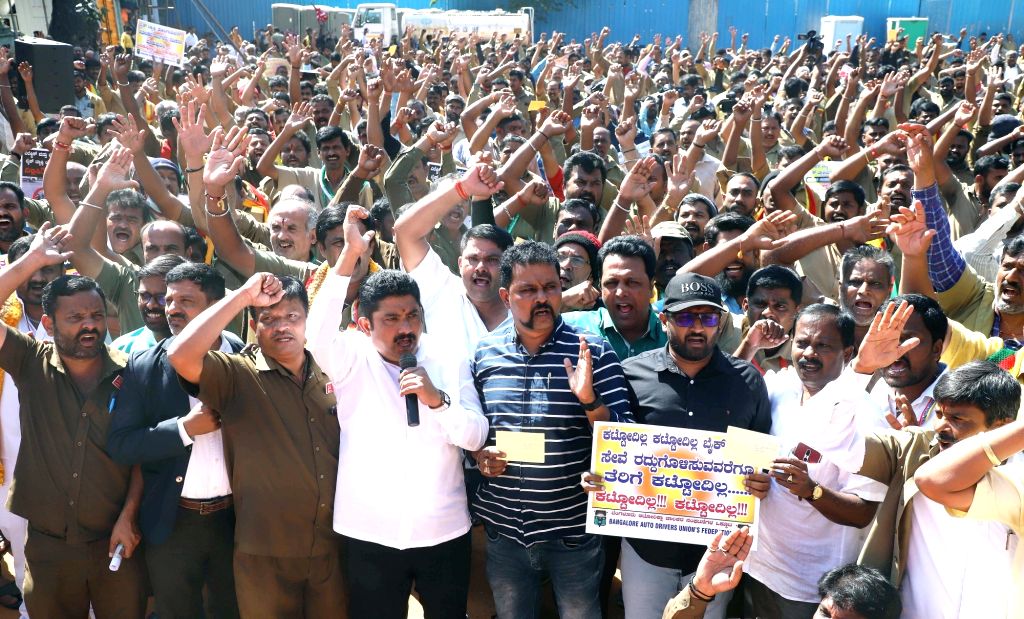Members of Bangalore Auto Drivers Union's Federation raise slogans ...
