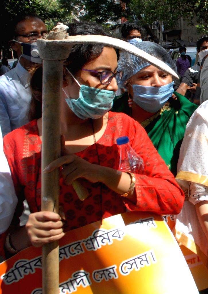 INTUC holds a rally to express solidarity with migrant workers