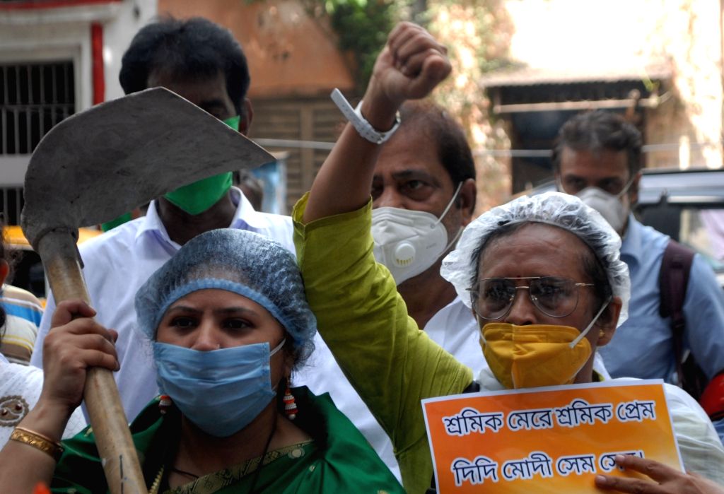 INTUC holds a rally to express solidarity with migrant workers